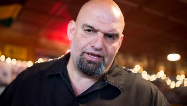 Fetterman returns to Senate after days in hospital, casts vote on ...