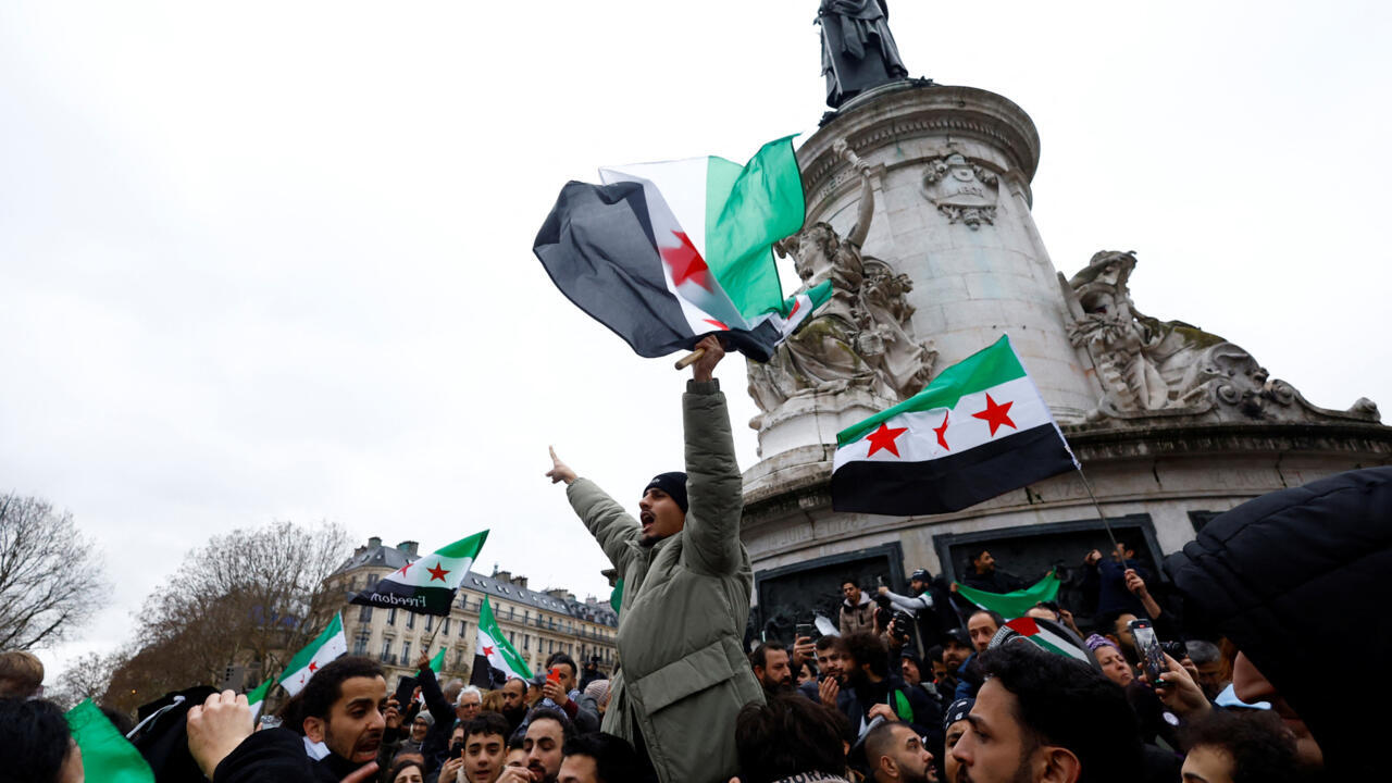 Syrians hold rallies in Paris and across Europe to celebrate fall of ...