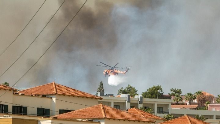 Rhodes fire burning at three fronts, in largest evacuation operation ...